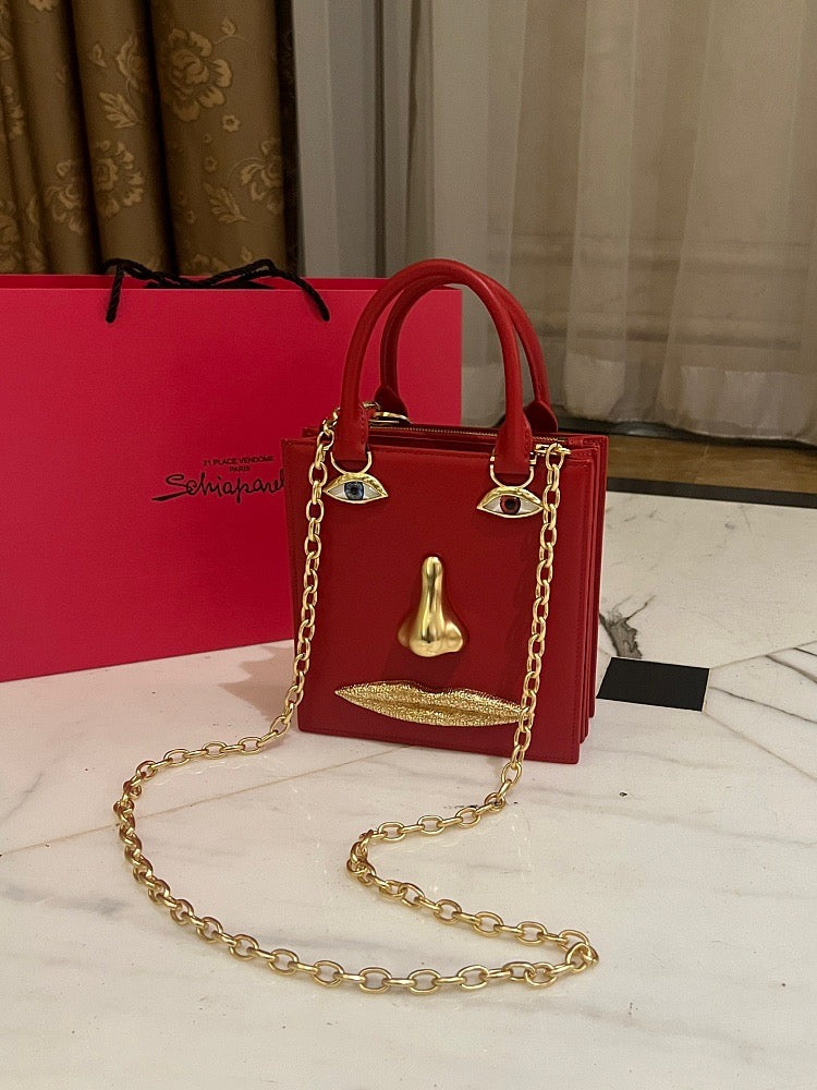 “Visage Rouge” Sculptural Face Bag by Schiaparelli – LUXE LIVING FASHIONS